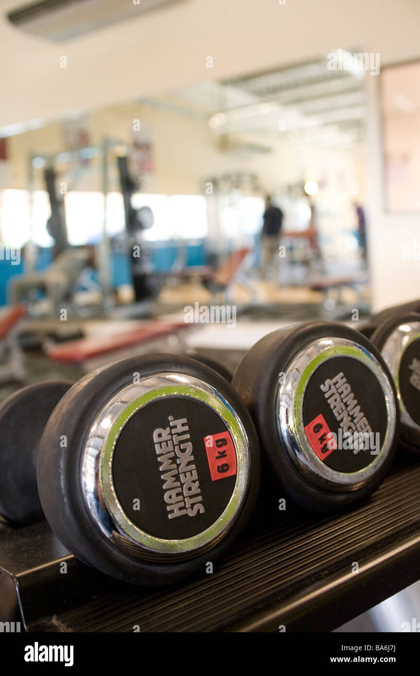 Dumbbells at a gym in a leisure centre Stock Photo - Alamy