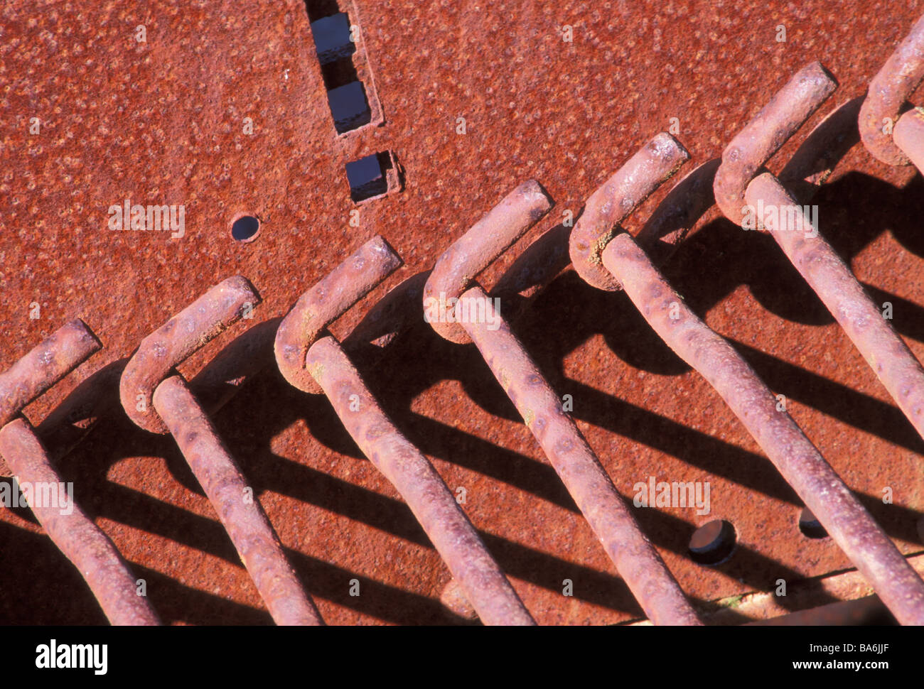 Rusted farm implements Stock Photo - Alamy