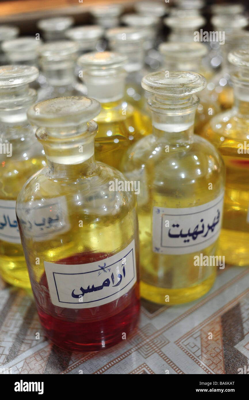 Egypt Aswan Bottles of scents and oils for making perfume line the ...