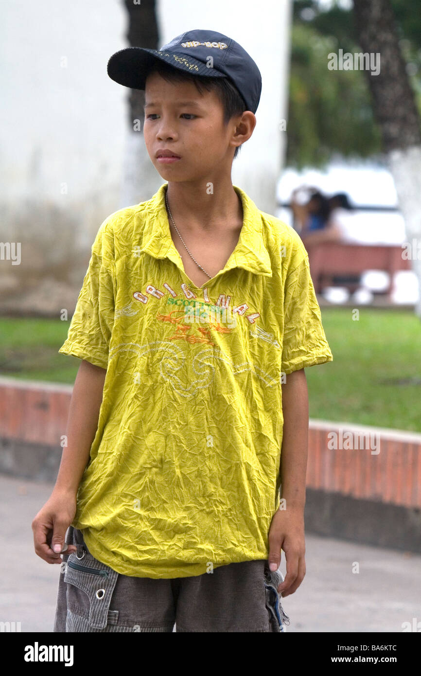 Vietnamese boy playing games on the street in Ho Chi Minh City Vietnam ...
