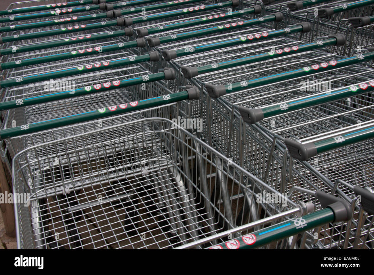 Cooperative shopping trolleys Stock Photo - Alamy