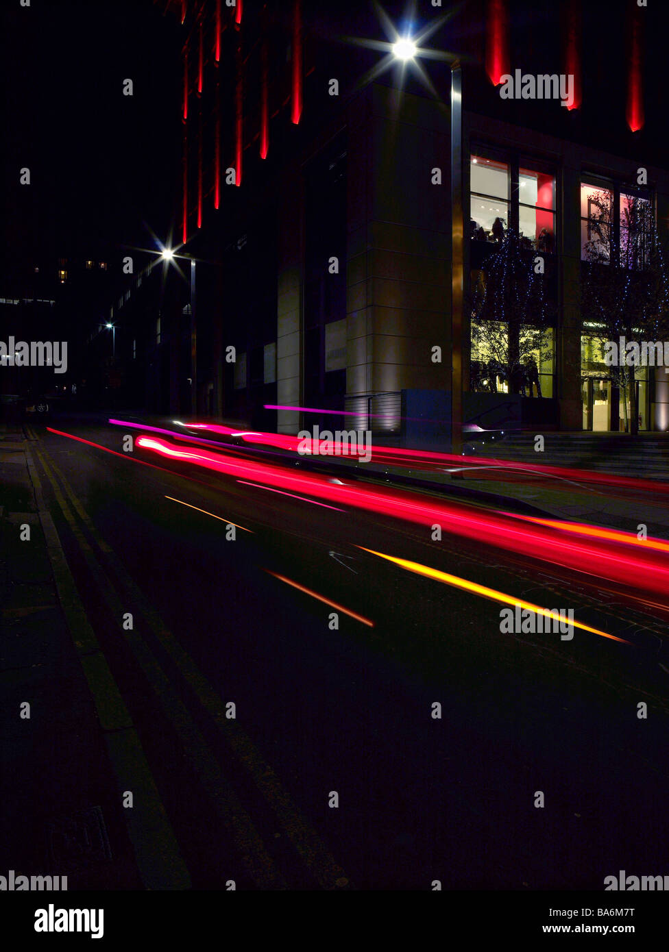 Traffic. Traffic down side street. Busy Road. Hectic. Busy Street. City ...