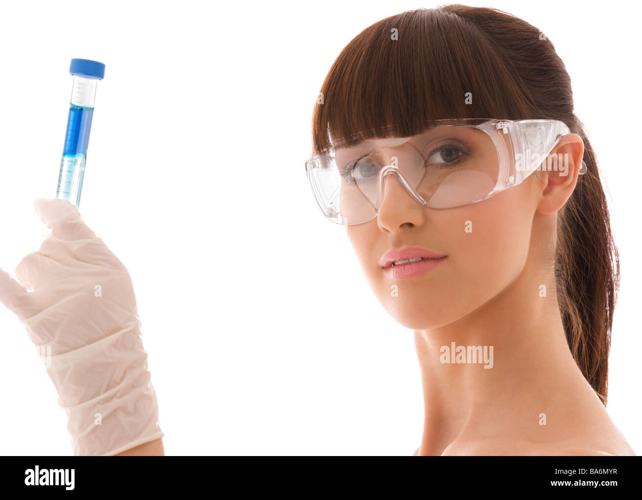 beautiful female lab worker holding up test tube Stock Photo - Alamy