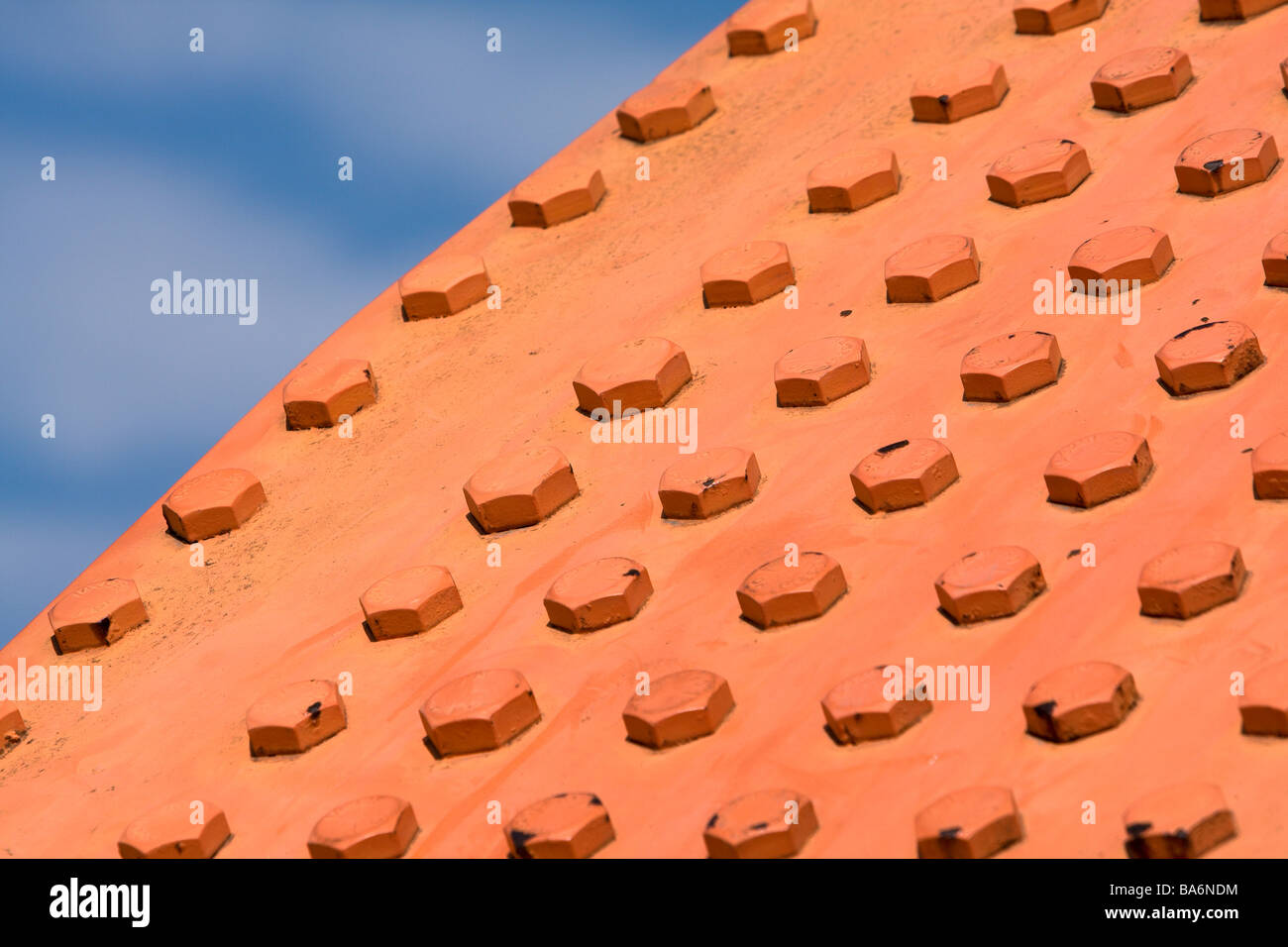 Hexagonal head screws assembly on iron bridge, red orange painted ...