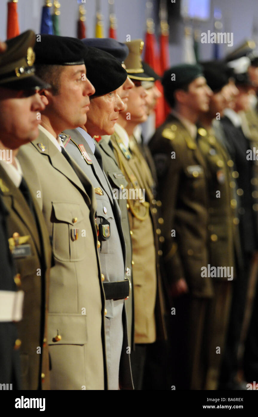 Military officers from the NATO countries standing in a room during the ...