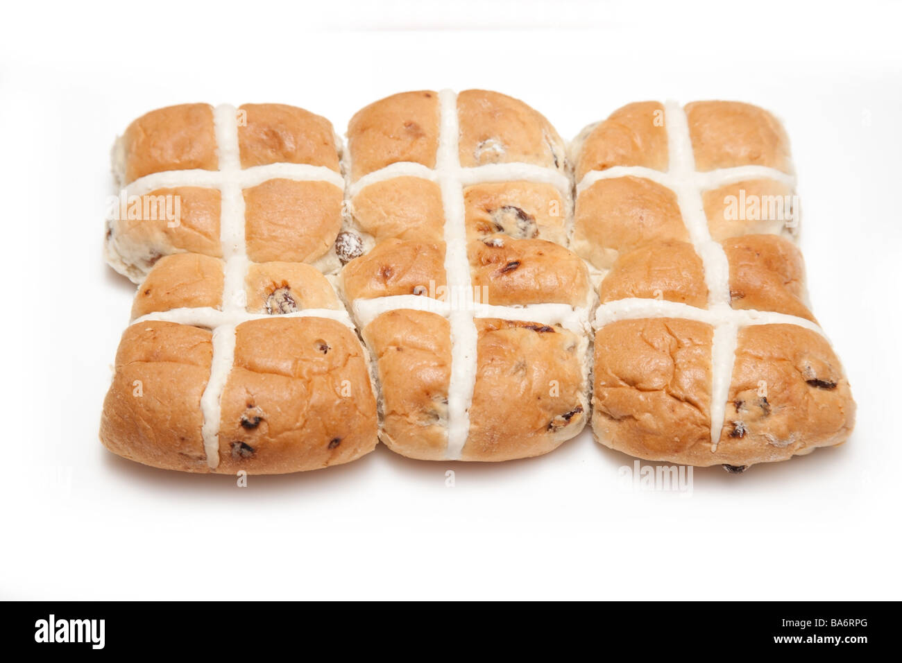 Hot cross buns isolated on a white studio background Stock Photo - Alamy