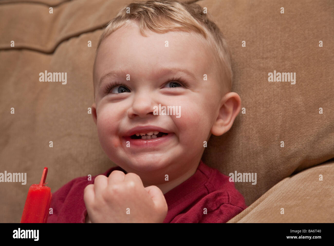 Kid eating a popsicle hi-res stock photography and images - Alamy