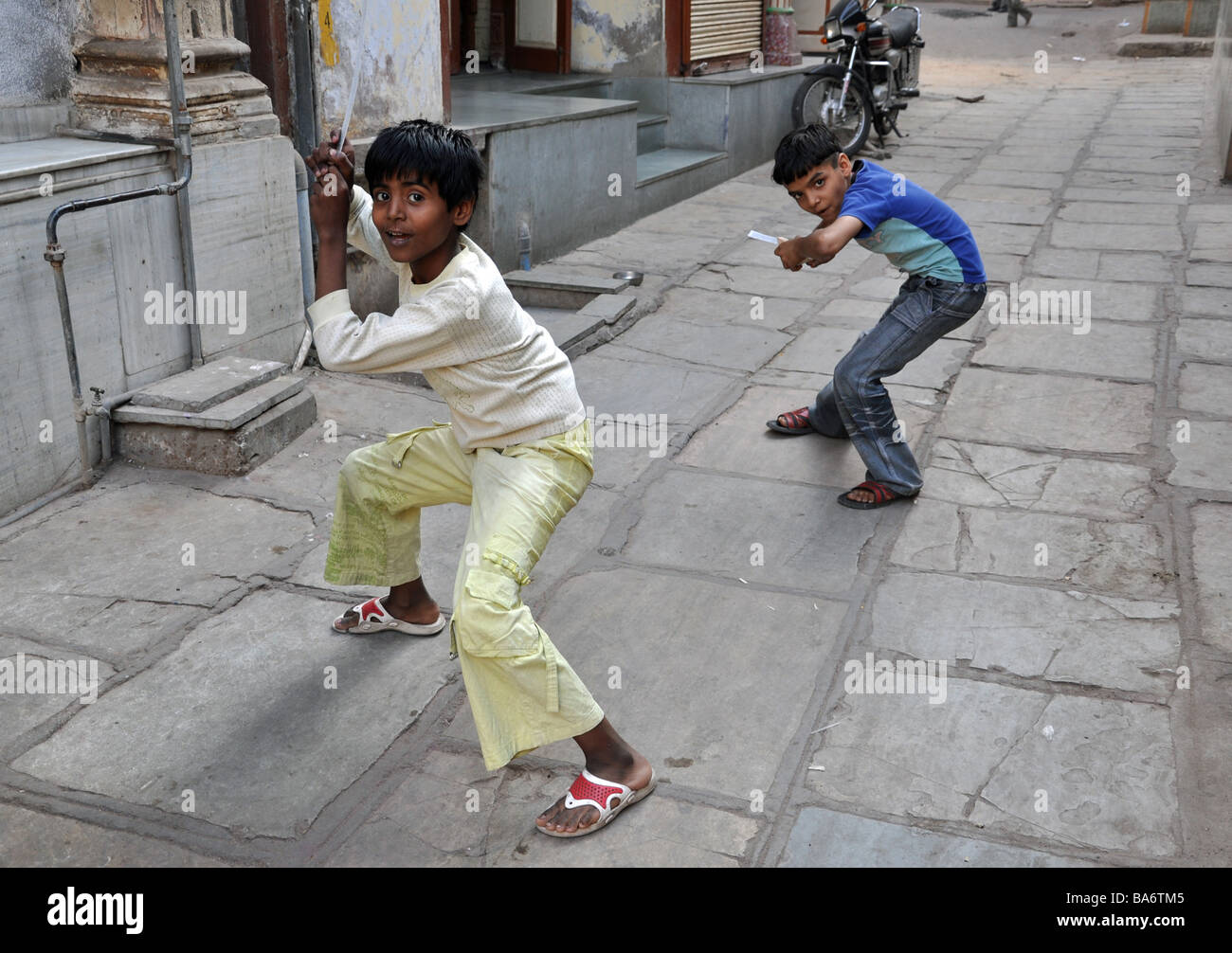 Children playing with rulers in Ahmedabad Stock Photo - Alamy