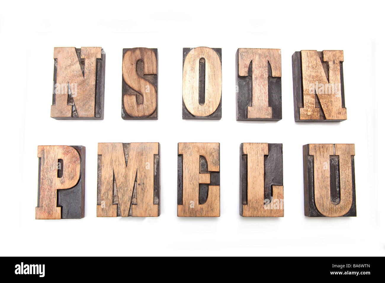 Wooden letterpress printing blocks isolated on a white studio ...