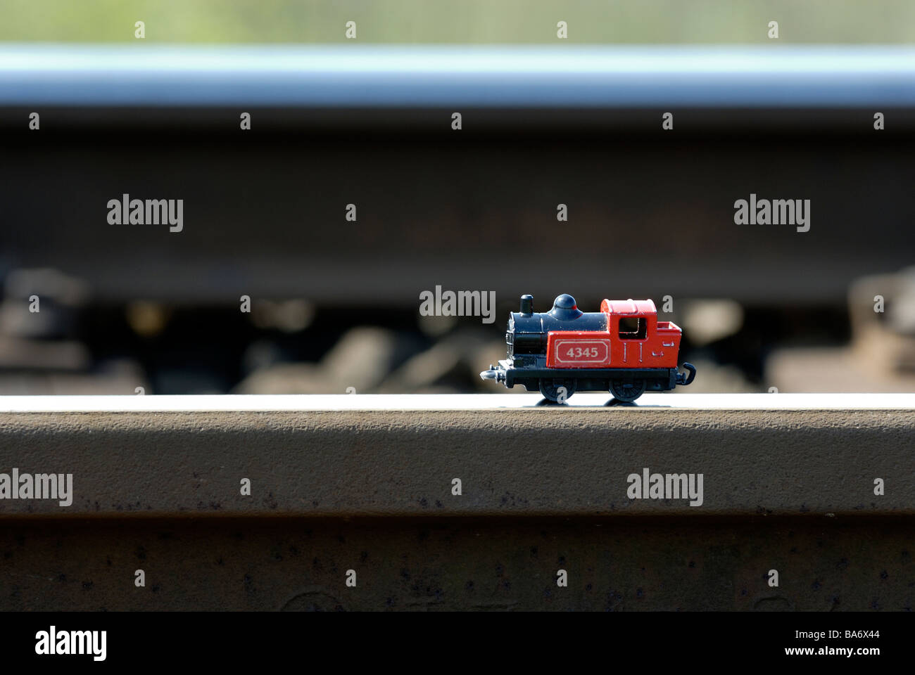 Steam locomotive engine, train model railway on real track outside ...