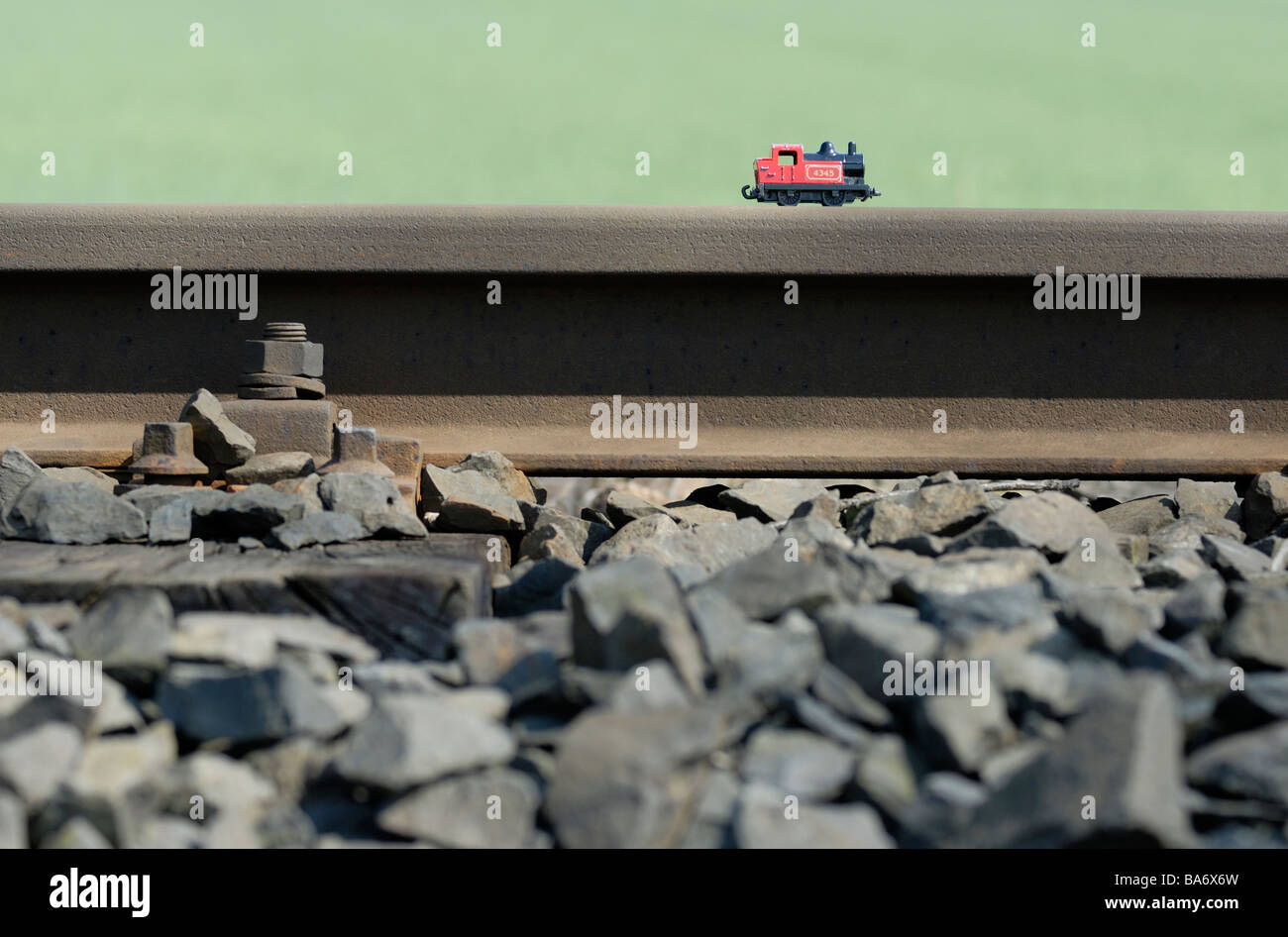 Steam locomotive engine, train model railway on real track outside ...