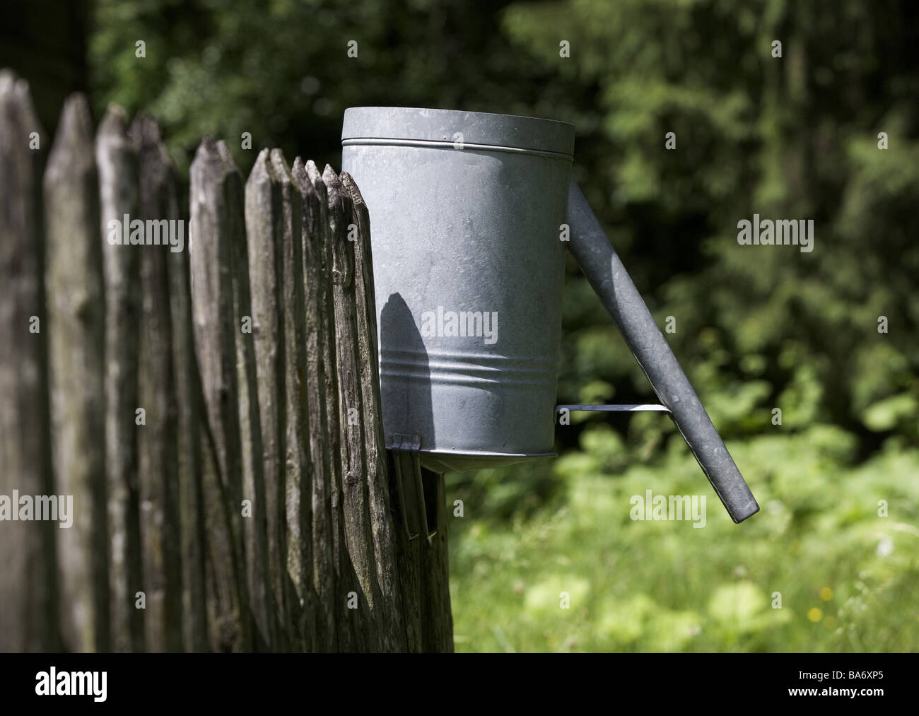Forest-edge fence sheet metal-watering can fence slat-fence wood-slats ...