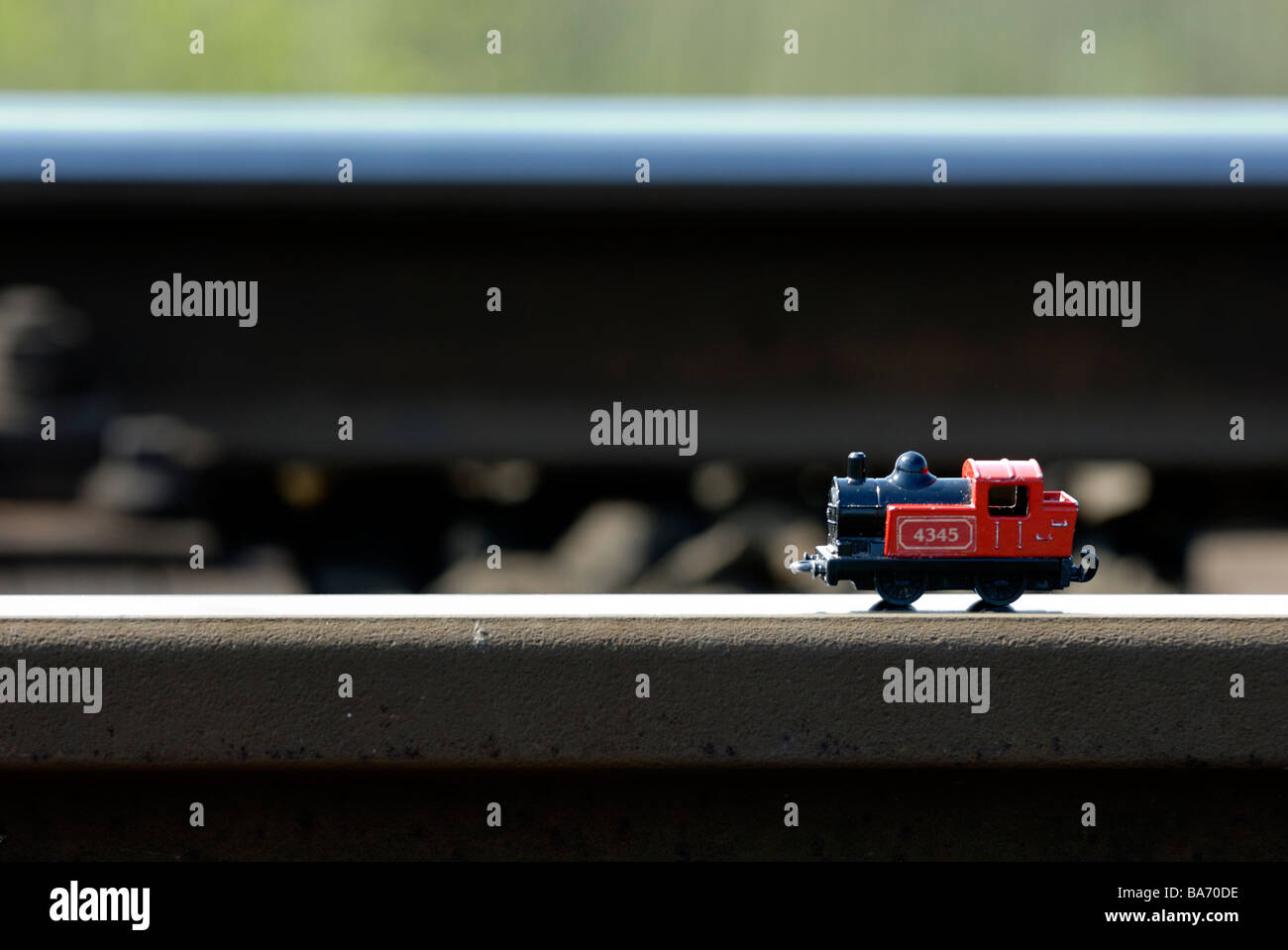 Steam locomotive engine, train model railway on real track outside ...