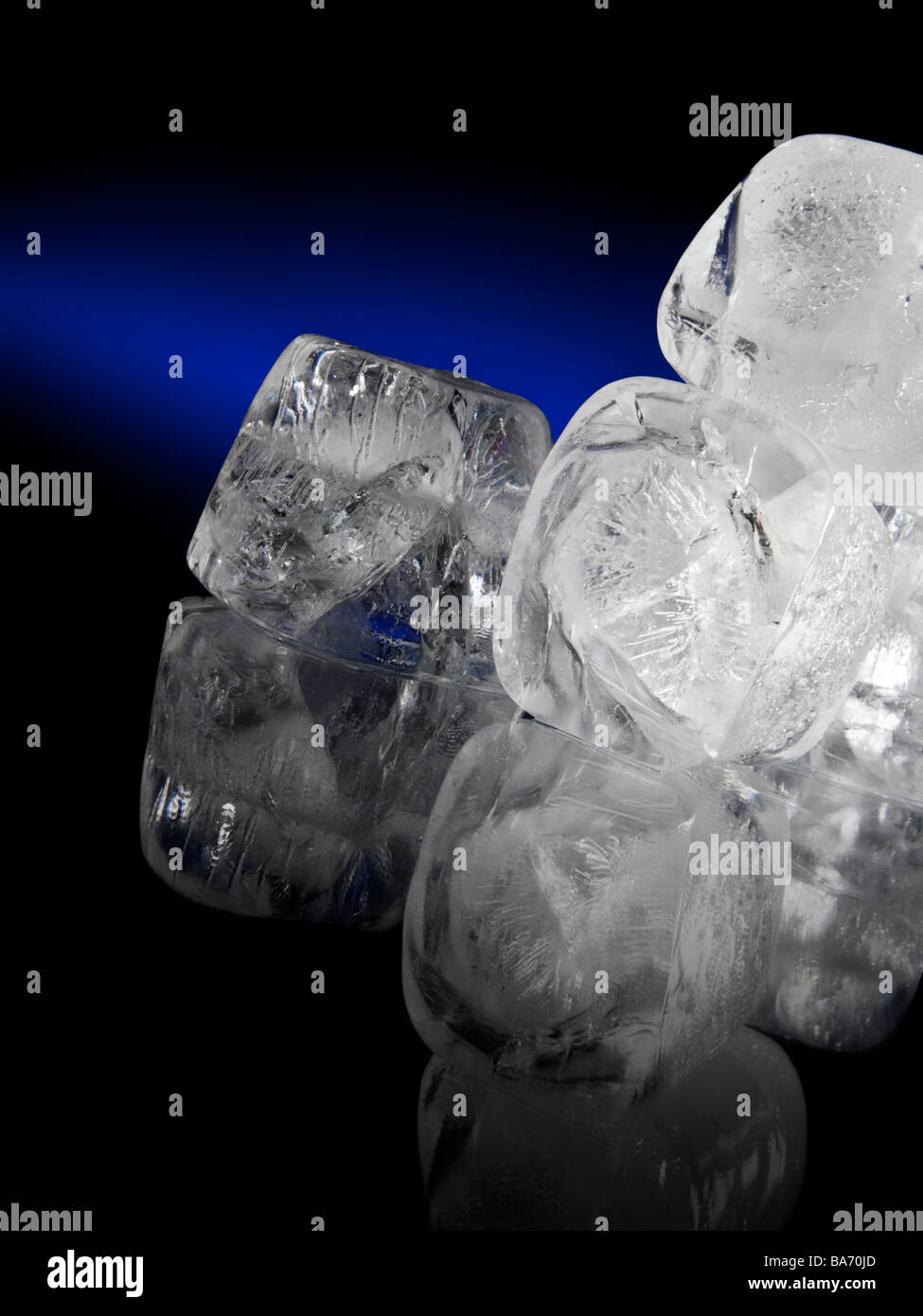 Four ice cubes Stock Photo - Alamy
