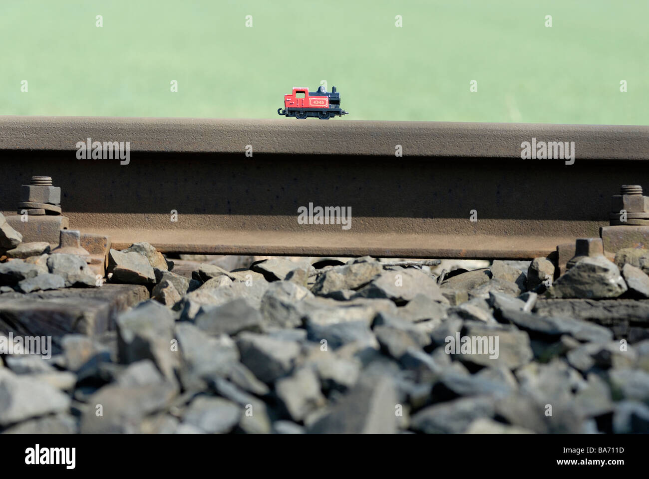 Steam locomotive engine, train model railway on real track outside ...