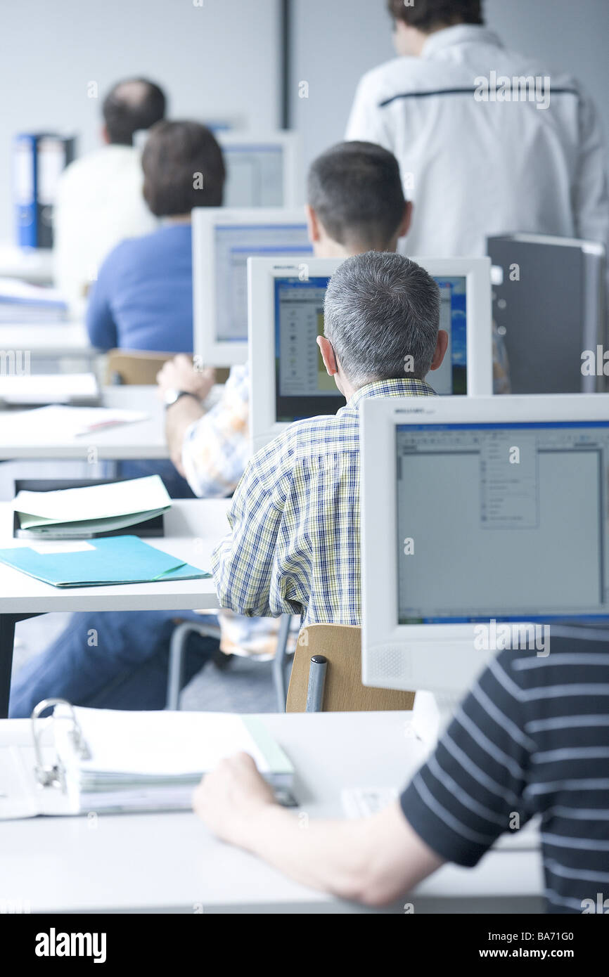 People computers training job open-plan office data input men work ...