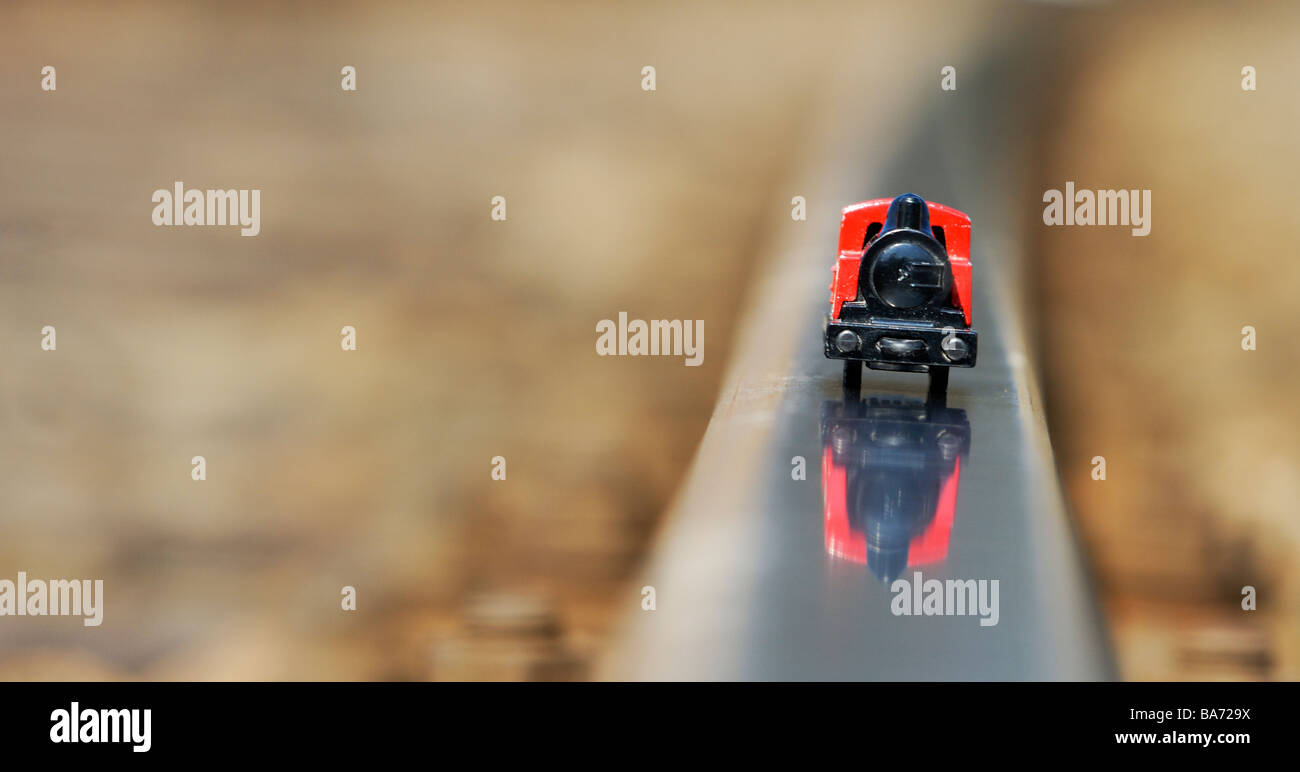 Steam locomotive engine, train model railway on real track outside ...