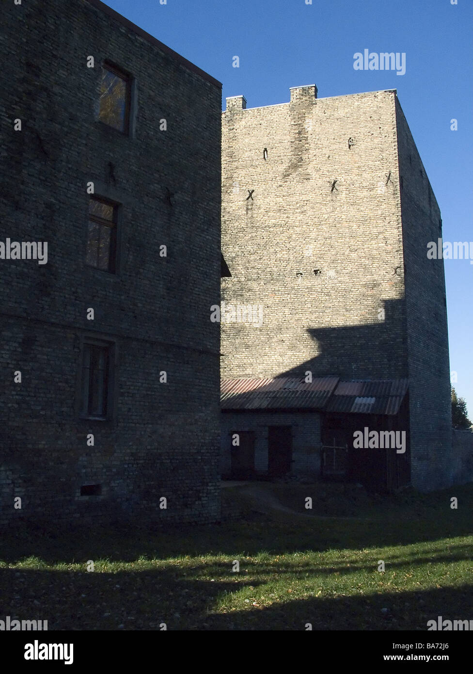 Lithuania Vilnius buildings old walls tower light shadows construction ...
