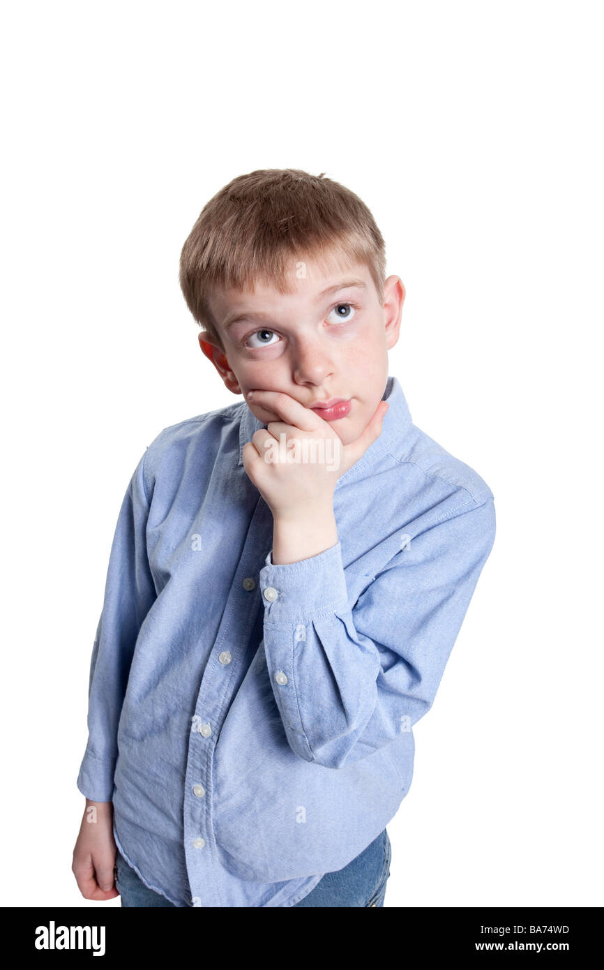 boy deep in thought isolated on white background in studio Stock Photo ...