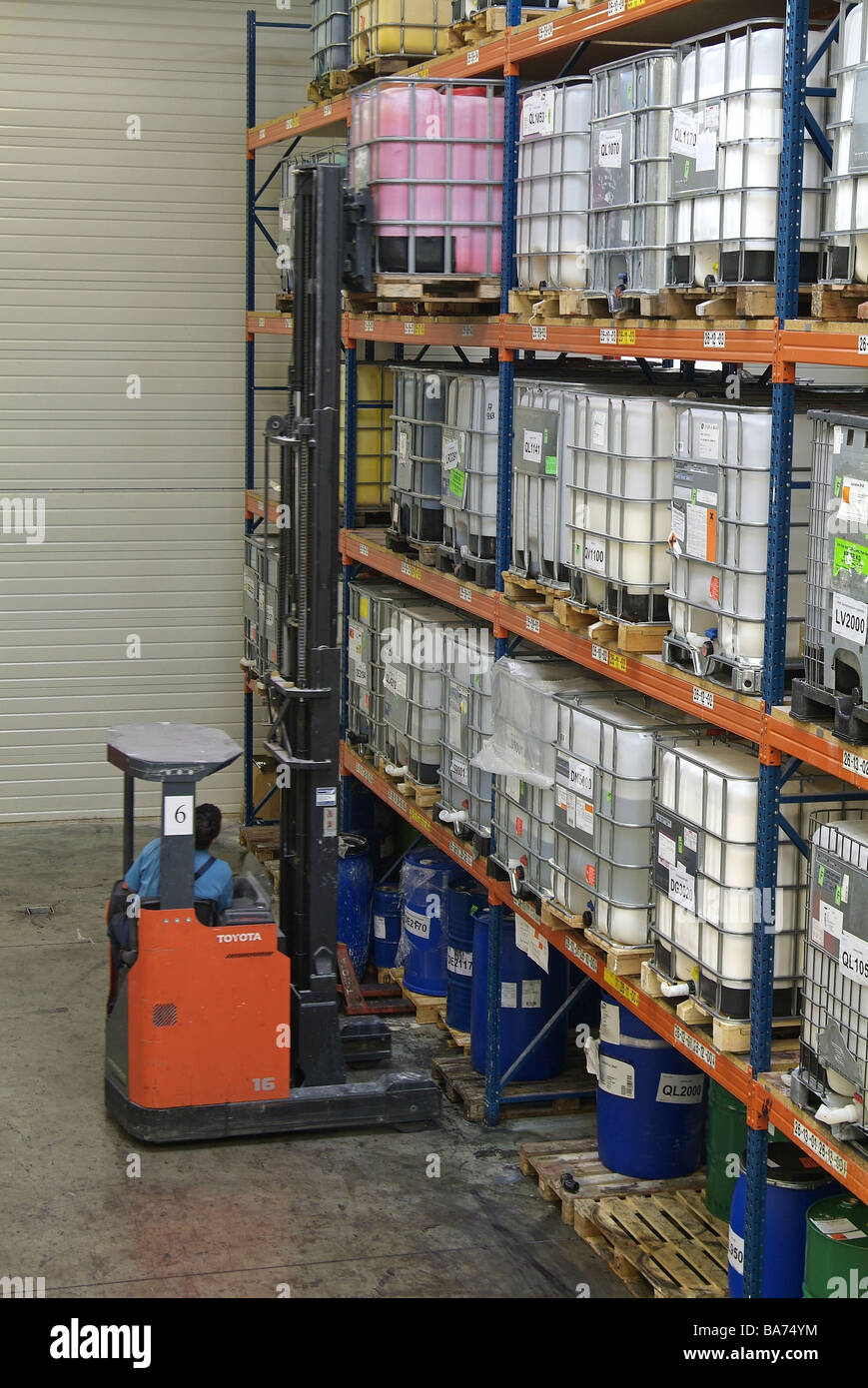 Factory warehouse shelves receptacles detail forklifts storage ...