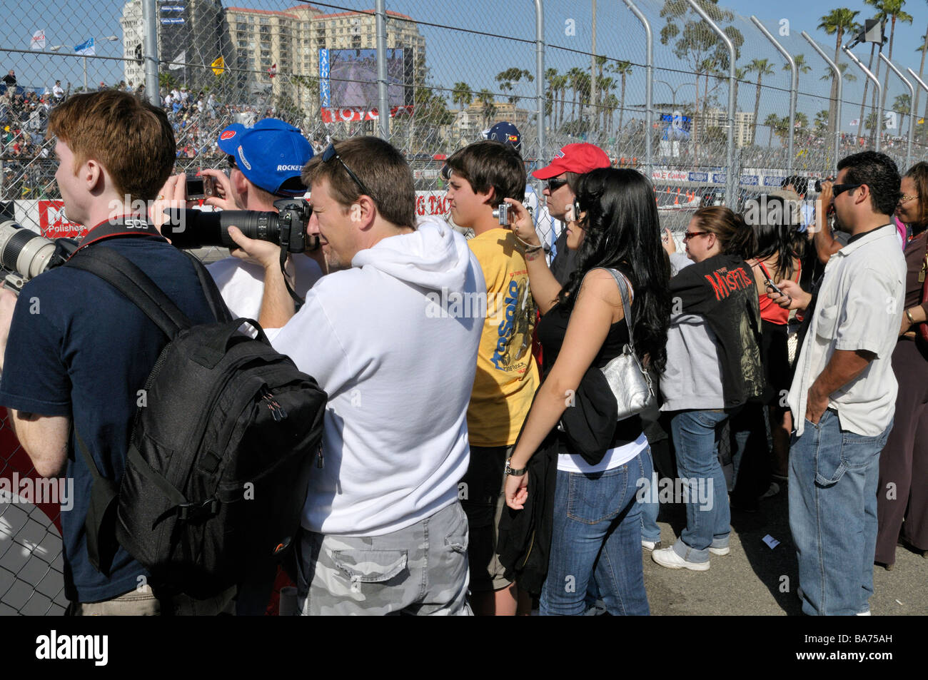 Throngs of people trying to get a good view of the popular Indy races ...