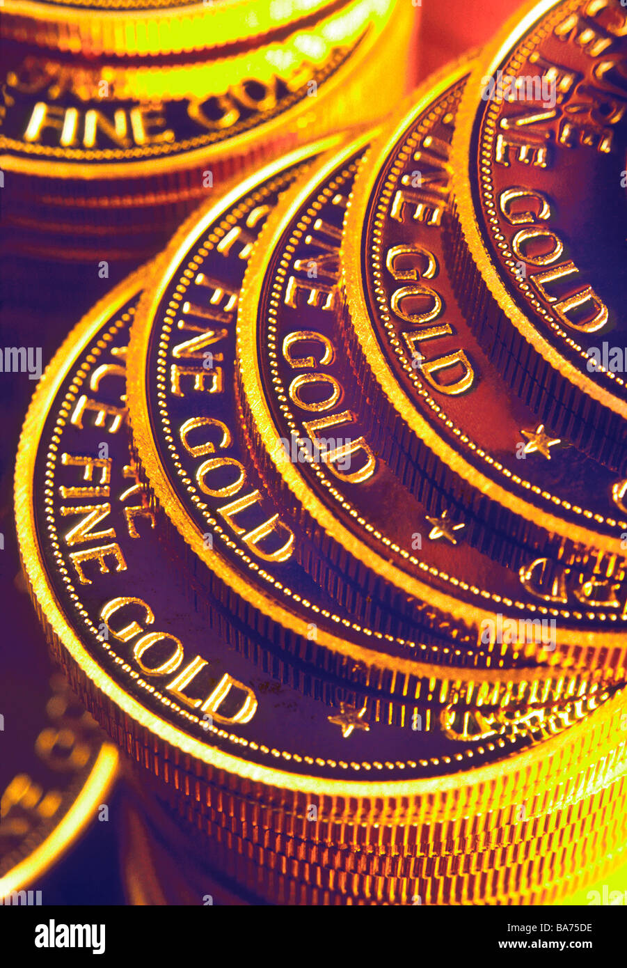 A stack of fine pure precious metal gold coins Stock Photo - Alamy