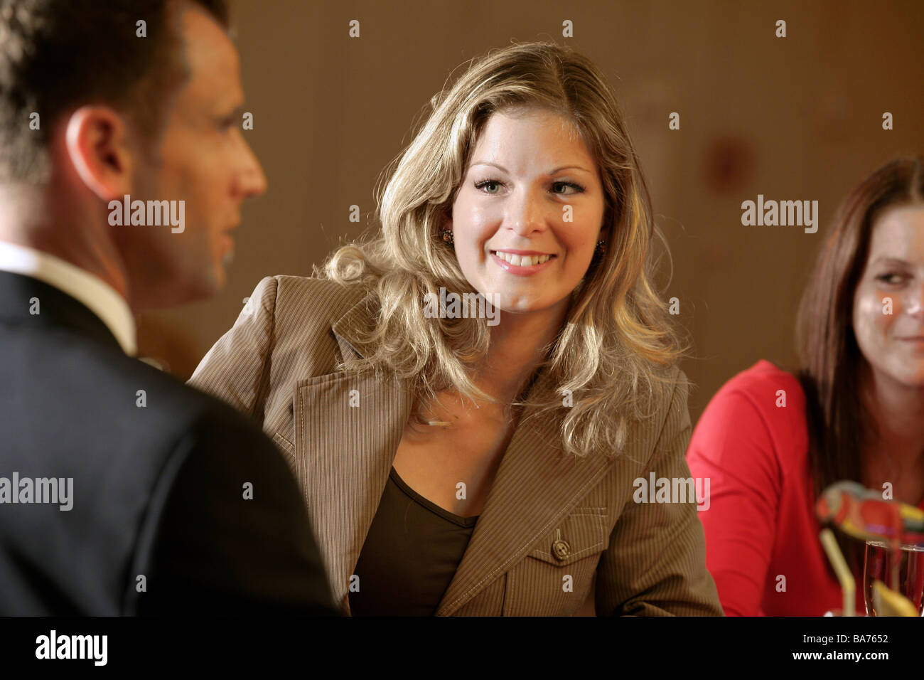 Women man flirt bar broached no models release Stock Photo - Alamy