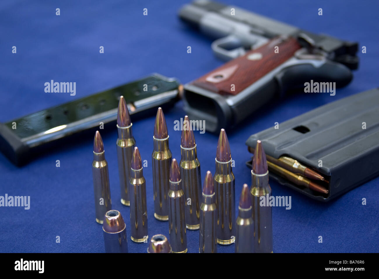 A variety of weapons and ammunition stand ready for use for military or ...