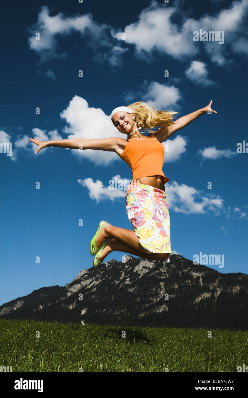 Teenagers girls air-jump cheerfully from below series people 18 years ...