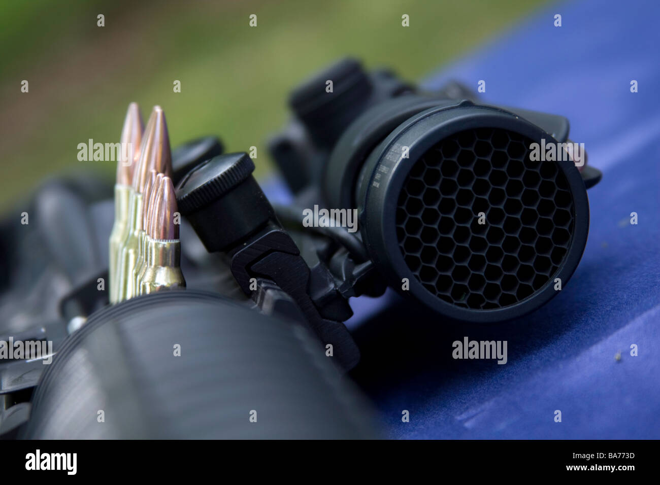 Different bullets stand ready in the chamber of an automatic rifle ...