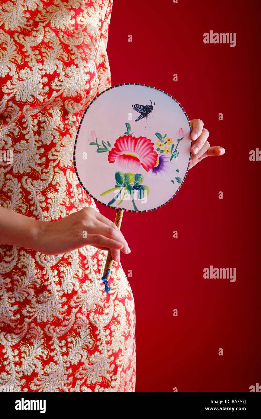 Cheongsam woman fan hi-res stock photography and images - Alamy