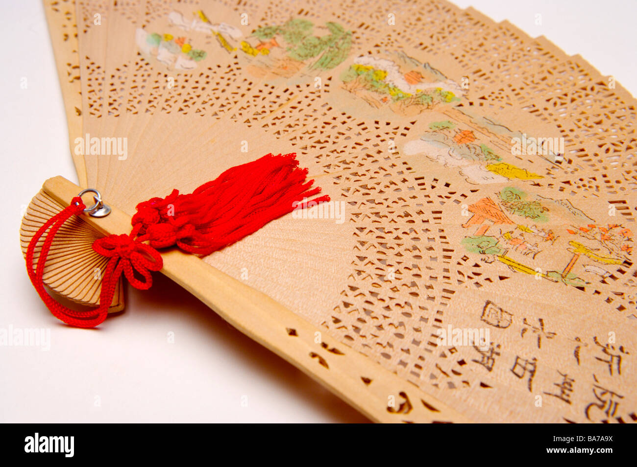 Chinese fan made of wood Stock Photo - Alamy