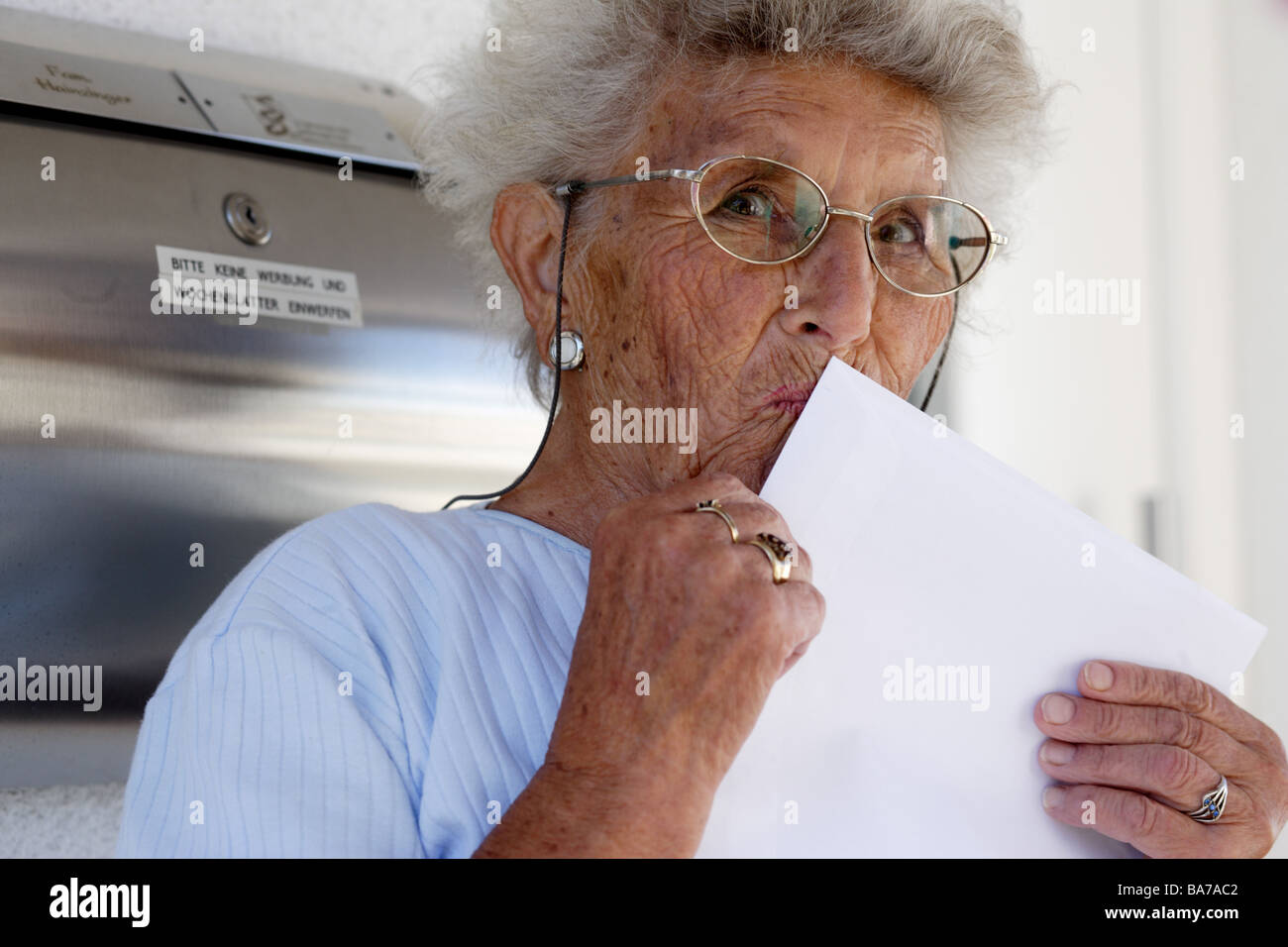 Senior mailbox letter holds facial expression portrait series broached ...