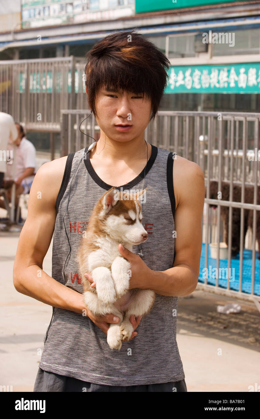 Dog man cage hi-res stock photography and images - Alamy