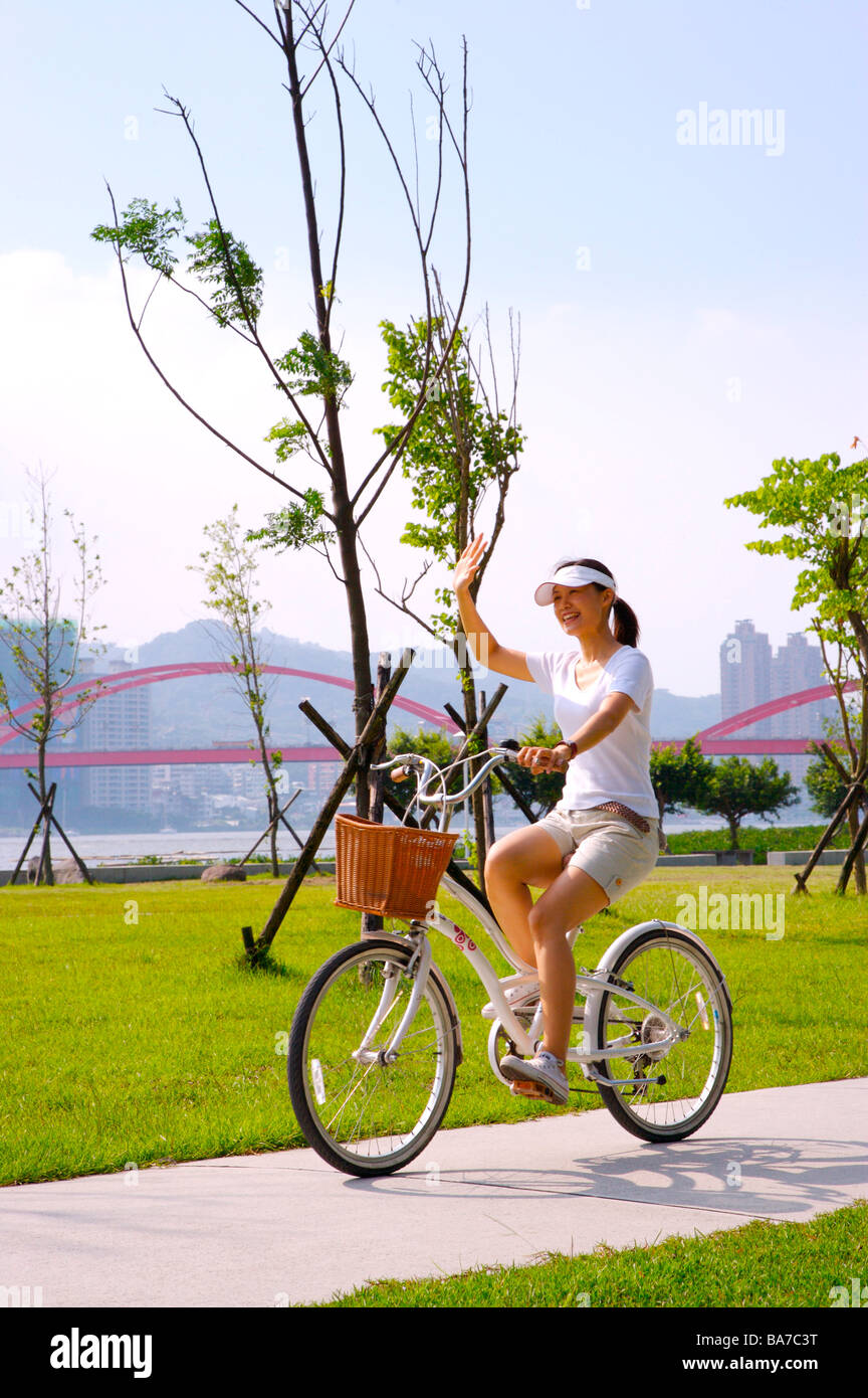 Young asian woman waving hand hi-res stock photography and images - Alamy