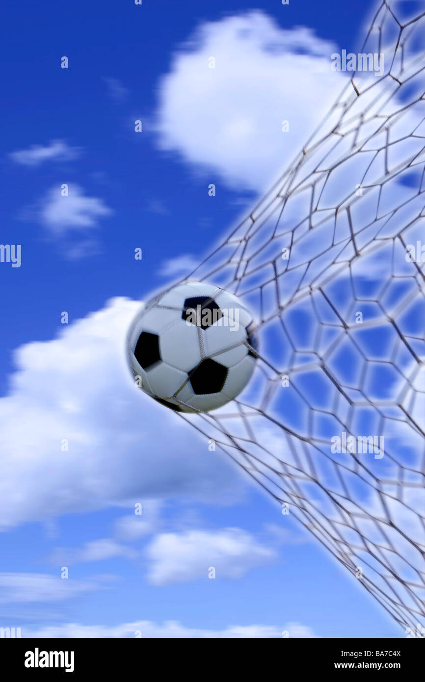 Soccer ball in net hi-res stock photography and images - Alamy