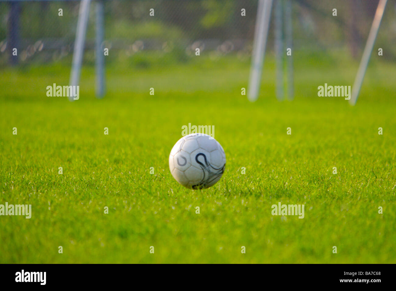 Flying soccer ball Stock Photo - Alamy