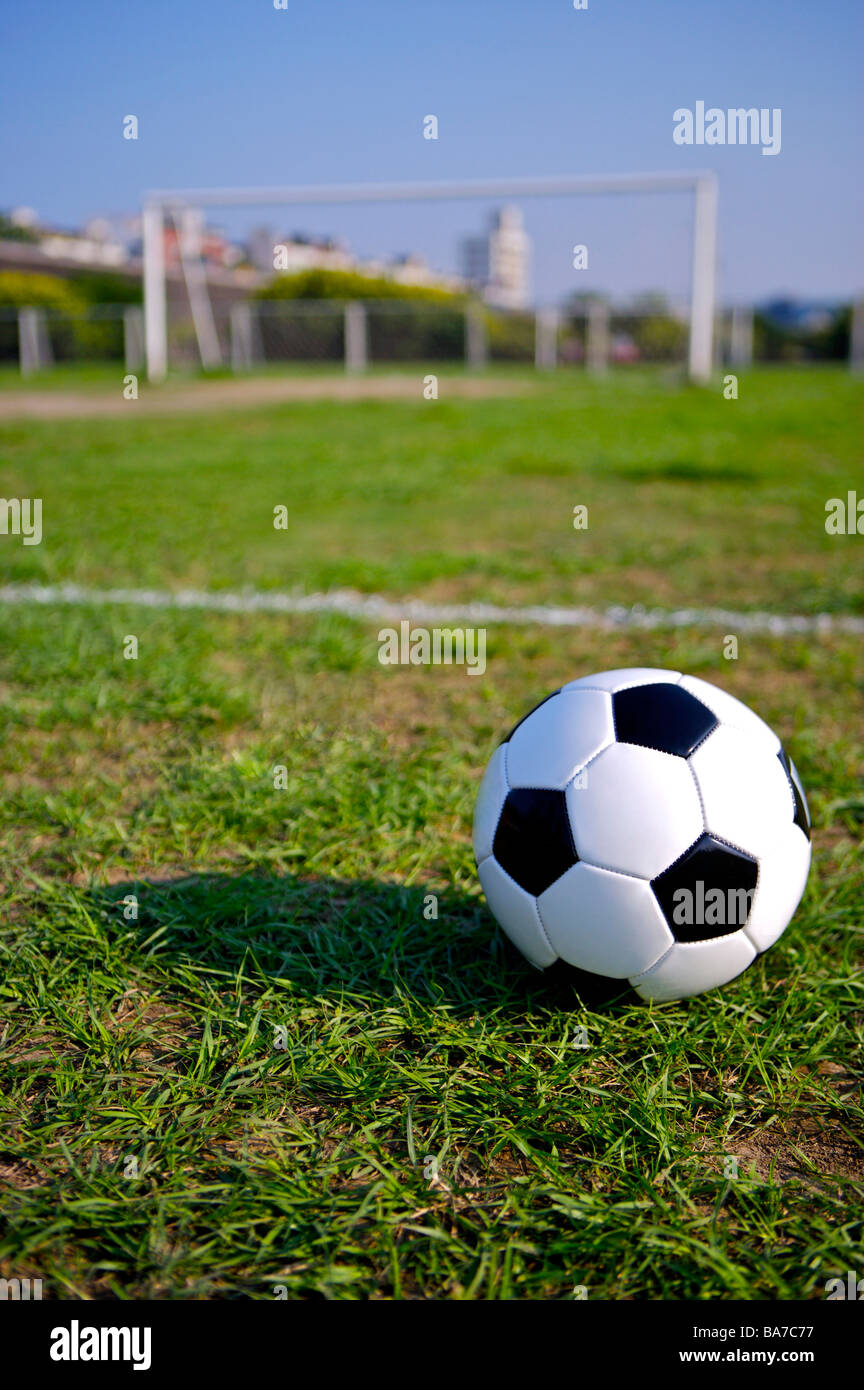 Ball on soccer field Stock Photo - Alamy