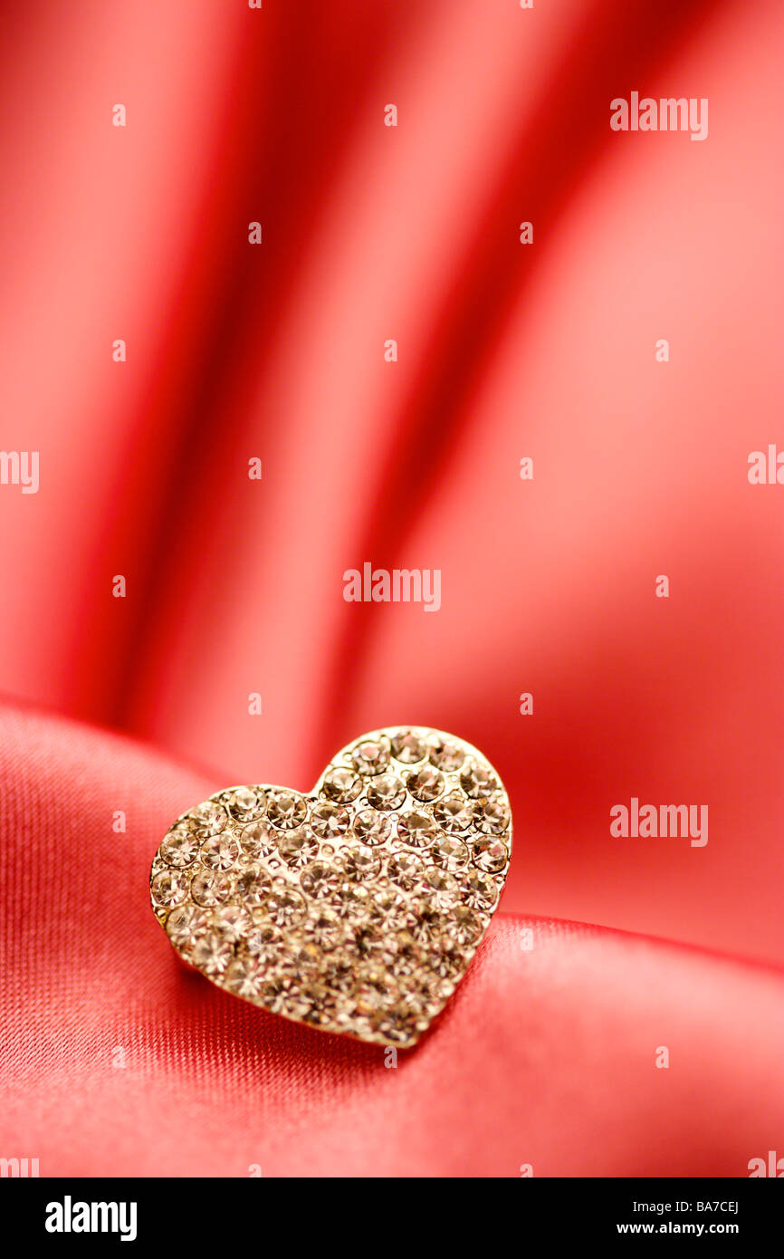 Precious stone on silk Stock Photo - Alamy