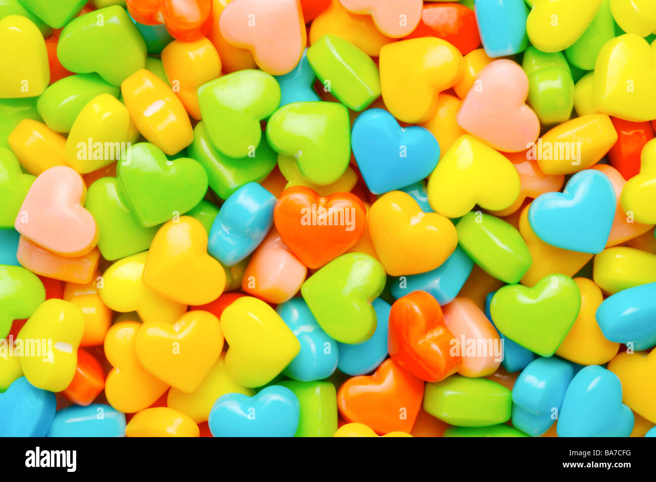 Colorful heart shaped candies full frame Stock Photo - Alamy
