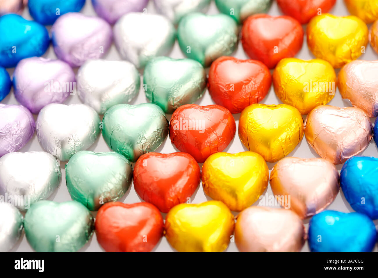 Colorful heart shaped candies Stock Photo - Alamy