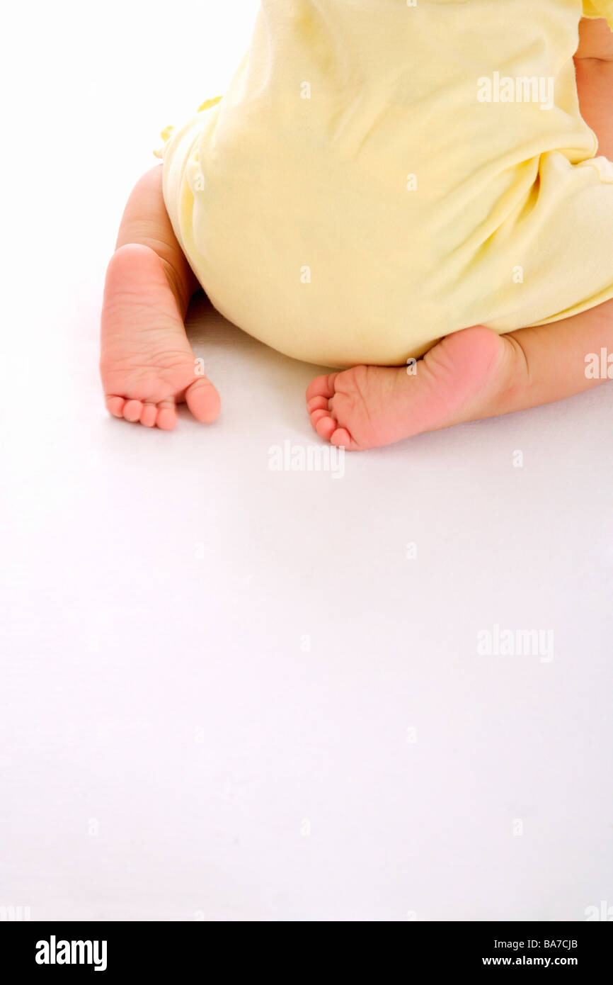 Baby girl rear view low section Stock Photo - Alamy