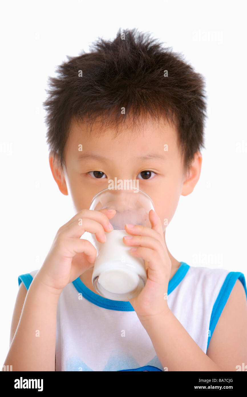 Boy drinking milk close up portrait Stock Photo - Alamy
