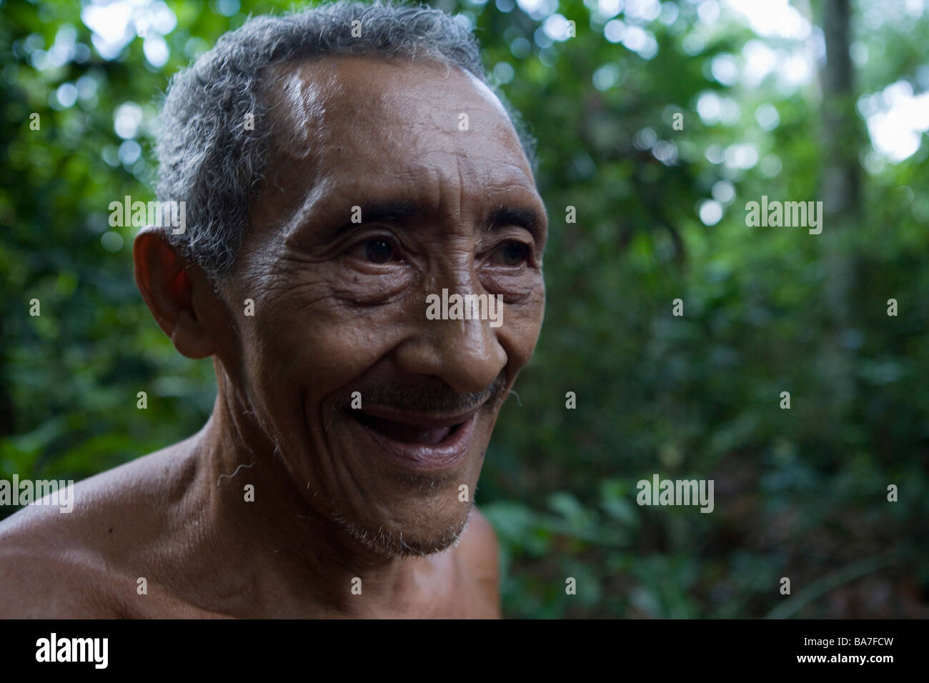 Cheerful Amazonian Man in the rainforest, Combo Island, near Belem ...