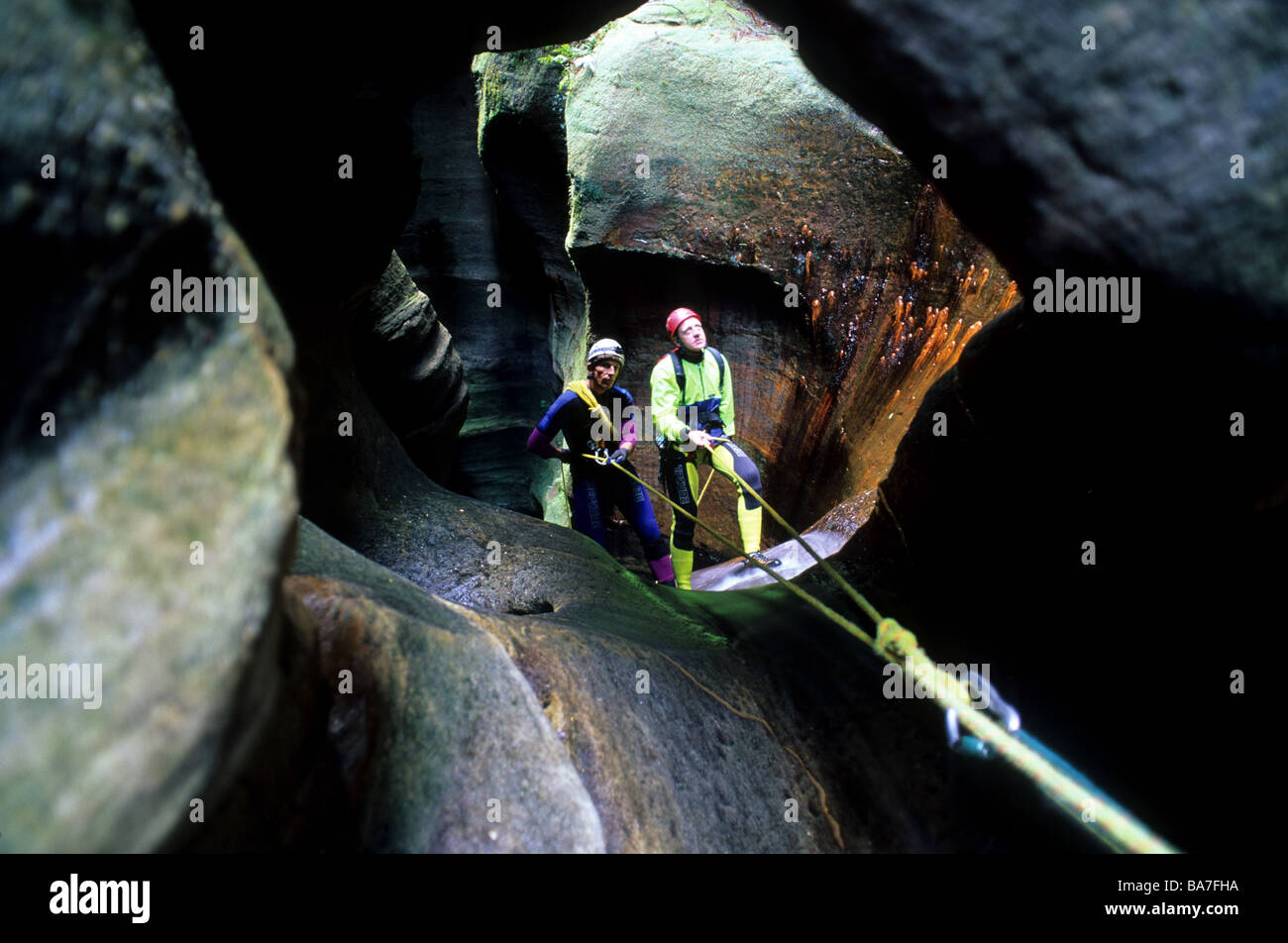 Two people canyoning in Claustral Canyon, Blue Mountains National Park ...