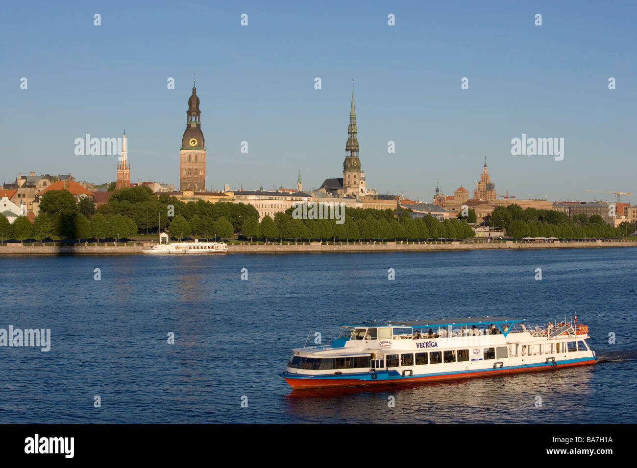 Cruise-ship on river Daugava and the skyline of Riga Stock Photo - Alamy