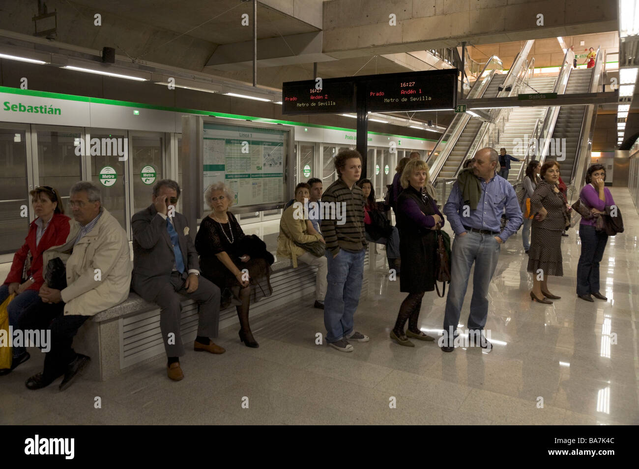 Prado de San Sebastian station platforms with waiting passengers ...