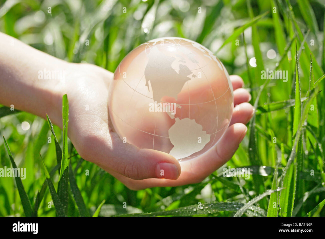 World on hands Stock Photo - Alamy