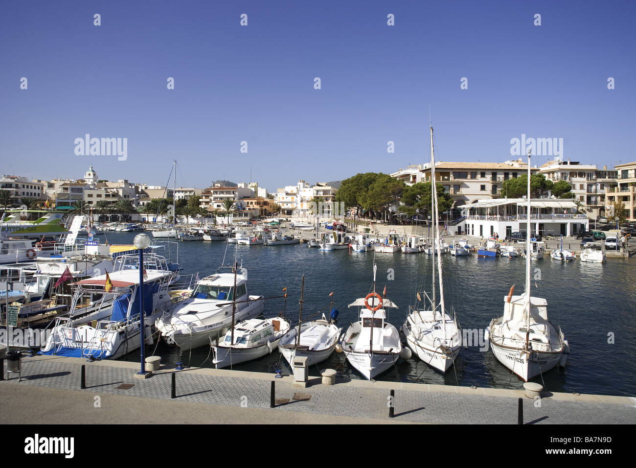 Spain Balearen island Majorca Cala Ratjada harbor boats ships city town ...