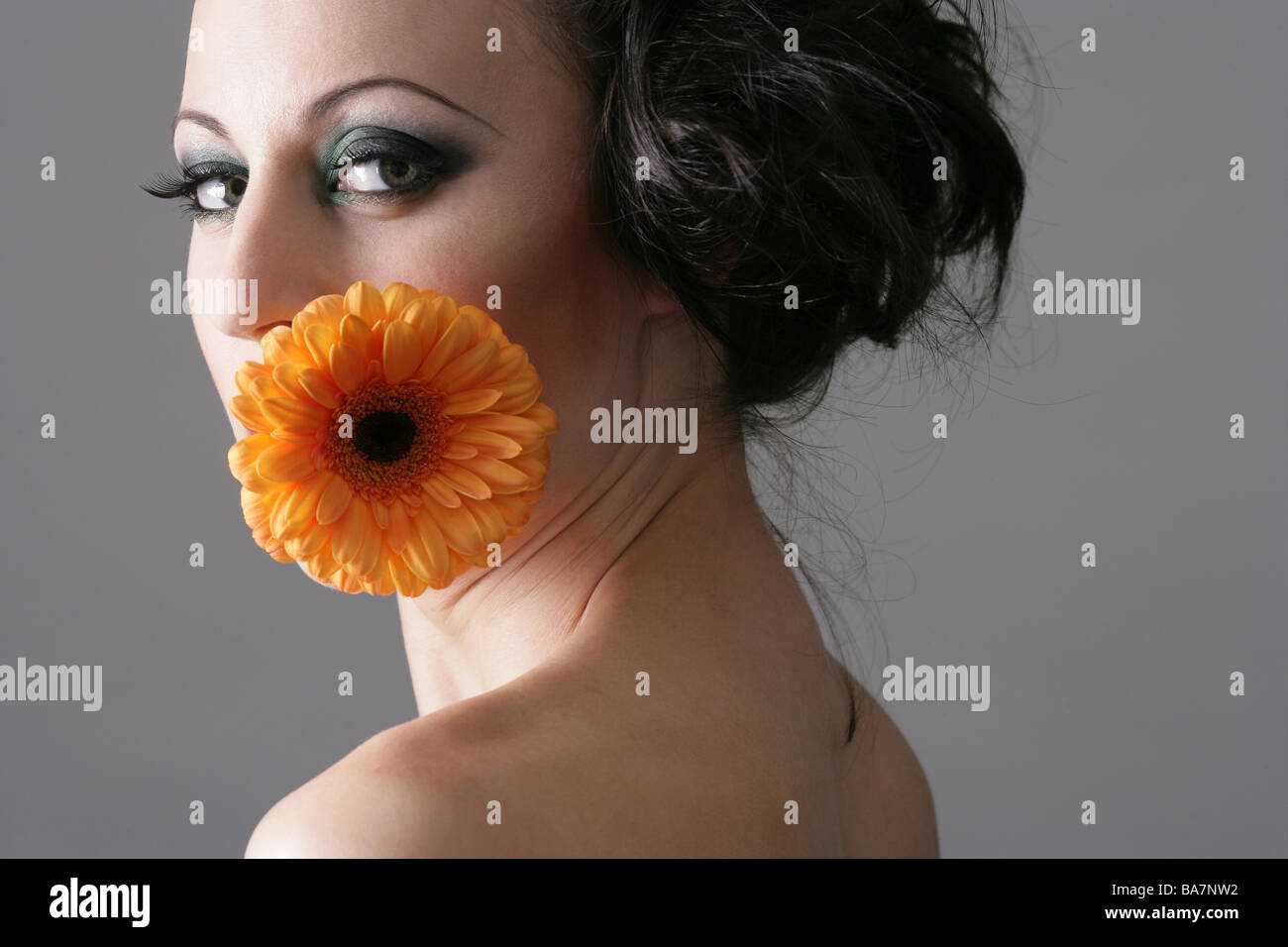 Female model with flower Stock Photo - Alamy